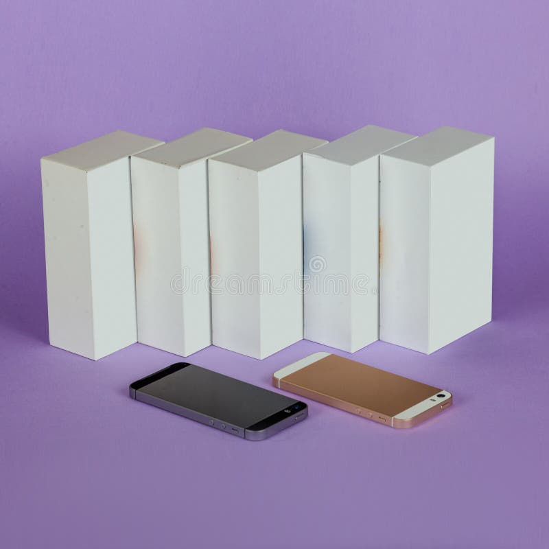 Modern Smart Phone with Box on Colorful Paper Background Stock Photo ...