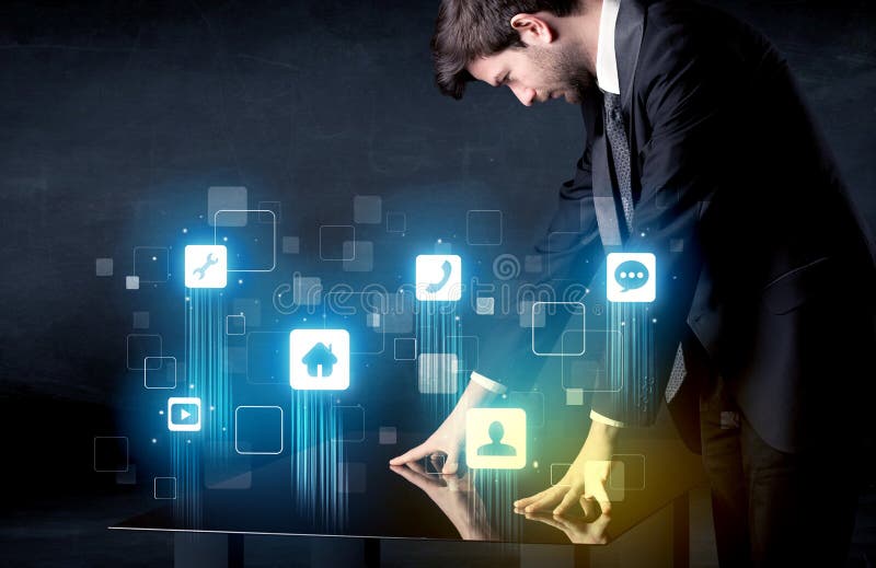 Modern Smart Table with High Tech Icons on Its Interface Screen Stock ...