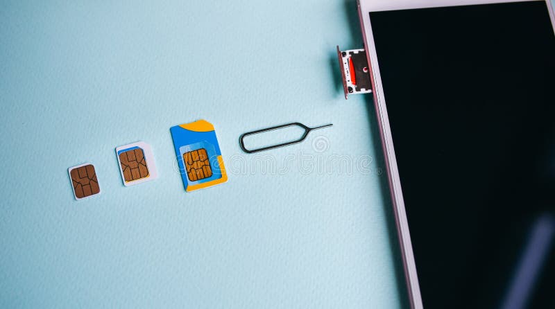Modern Smartphone Lying on the Table. Different Micro and Nano Sim ...