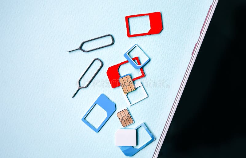 Modern Smartphone Lying on the Table. Different Micro and Nano Sim ...