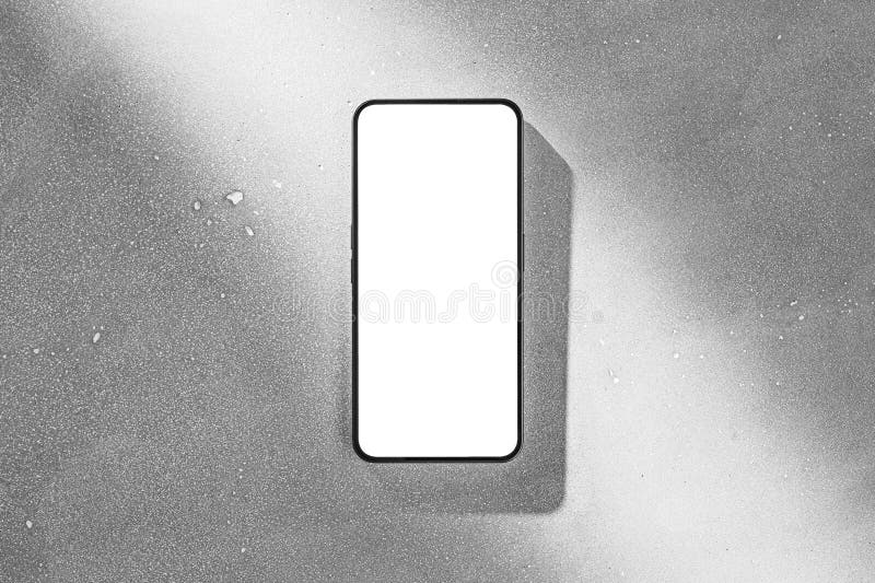 Modern Smartphone Placed on a Textured Grey Surface in Monochrome Stock ...