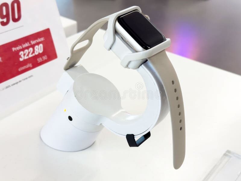 Modern Smartwatch Display on White Stand in Electronics Store Editorial ...