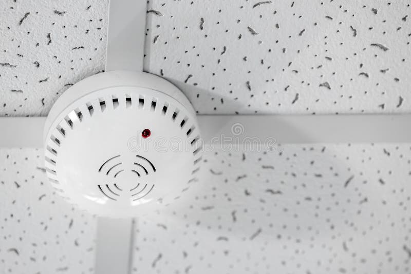 Modern Smoke Detector on Ceiling Indoors Stock Photo - Image of ...