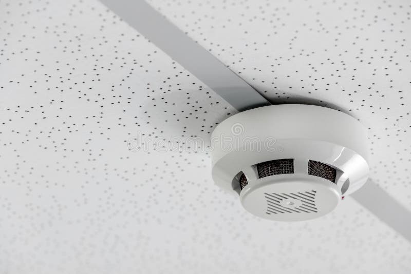 Modern Smoke Detector on Ceiling Indoors Stock Photo - Image of ...