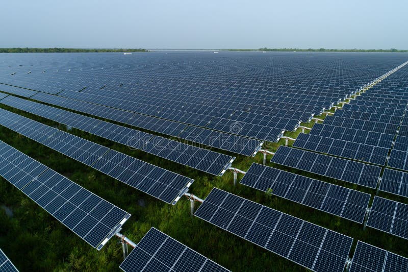 Modern Solar Panels on Grass Fields with Sunset Bright Sky on the ...