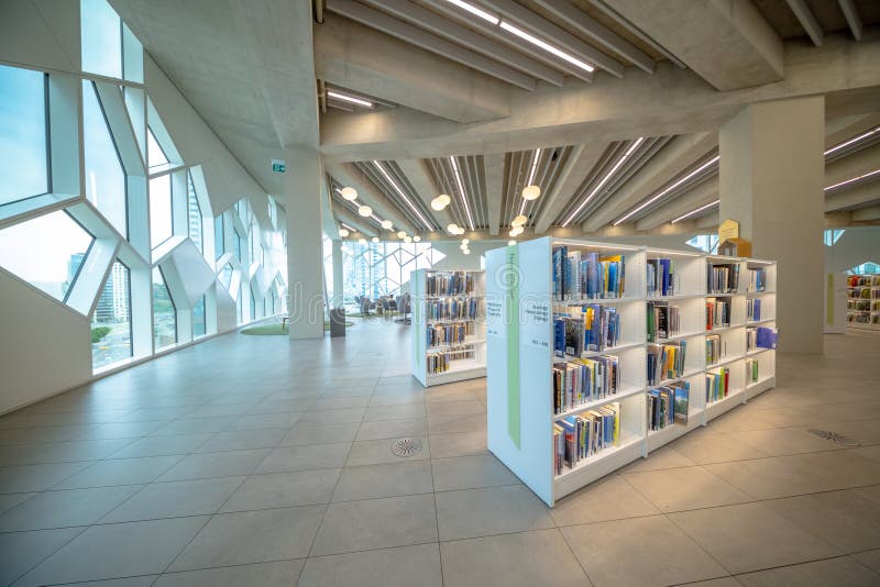 A Modern and Spacious Bookshelves at the Calgary Library with Interior ...