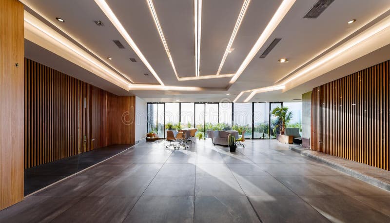 Modern, Spacious Office Lobby with Wooden Paneling and Glass Partitions ...