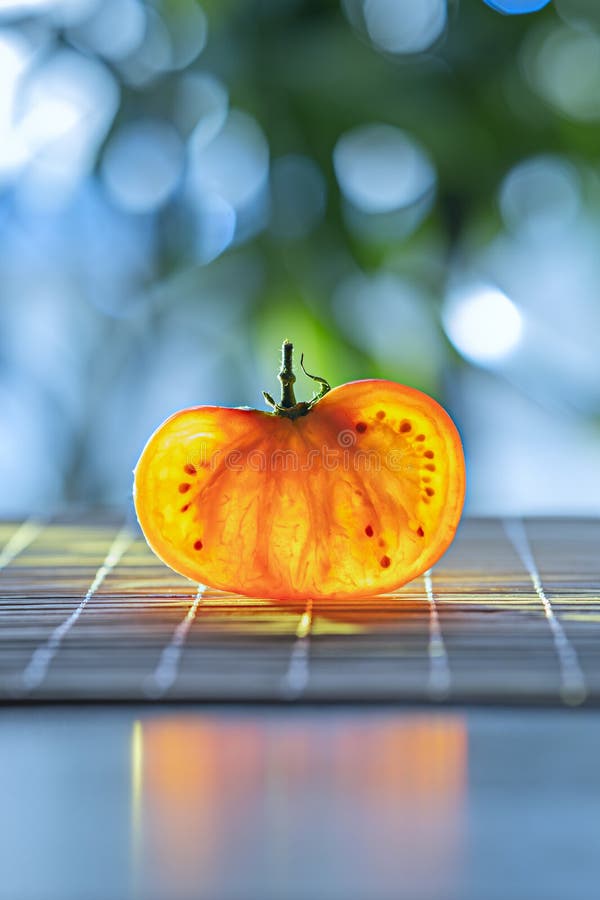 Modern Spanish Still Life: a Transparent Tomato Slice in Vertical Stock ...