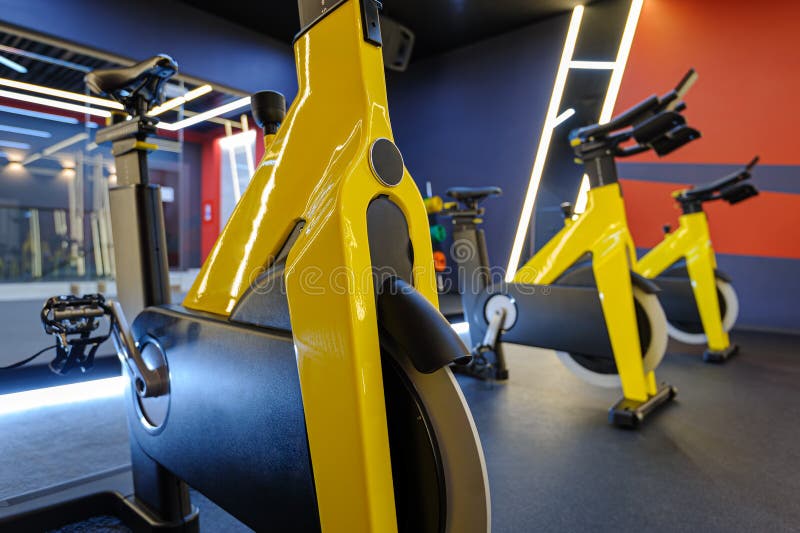Modern Spinning Indoor Bikes Class Stock Photo - Image of floor, group ...