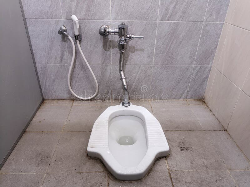 Modern Squat Toilet with Shower in Public Bathroom Stock Photo - Image ...