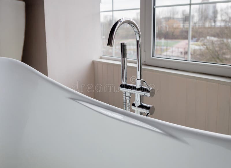 Stainless Faucet for Tub stock image. Image of plumbing - 359170025