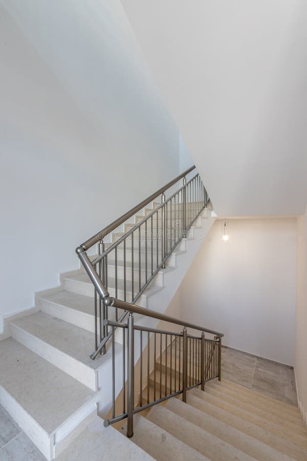 Modern Stair Case between Floors. Stairs with Metallic Rail in Modern ...