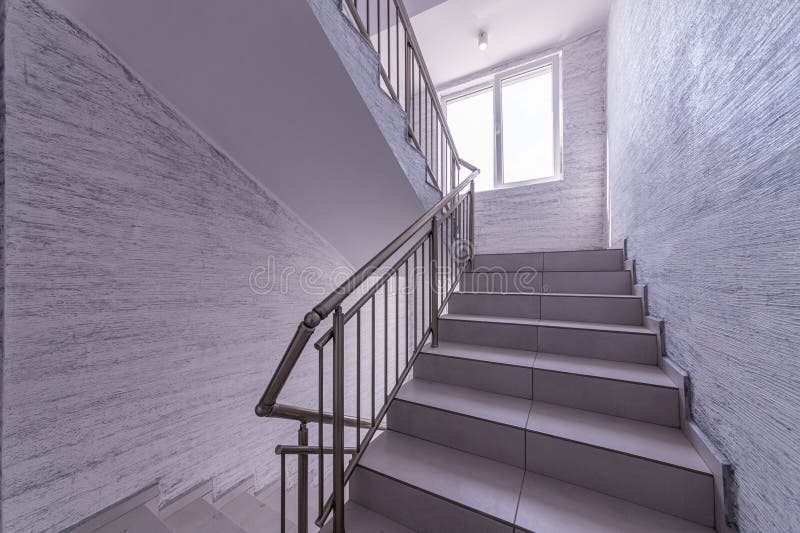 Modern Stair Case between Floors. Stairs with Metallic Rail in Modern ...
