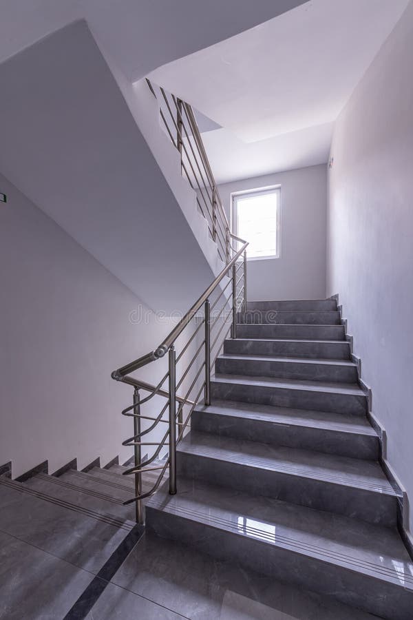 Modern Stair Case between Floors. Stairs with Metallic Rail in Modern ...