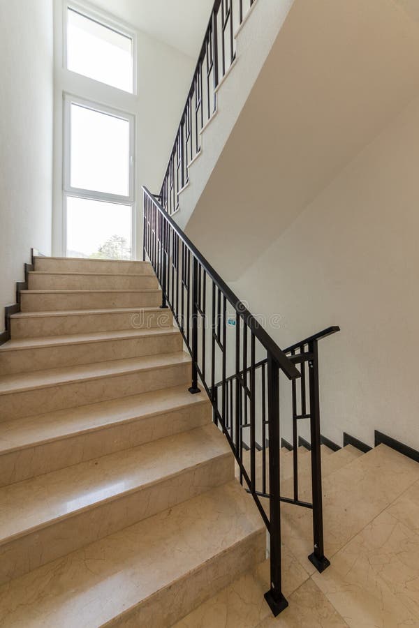 Modern Stair Case between Floors. Stairs with Metallic Rail in Modern ...