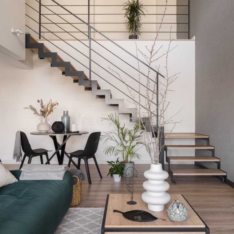 Modern Staircase in Living Room with Table Stock Photo - Image of ...