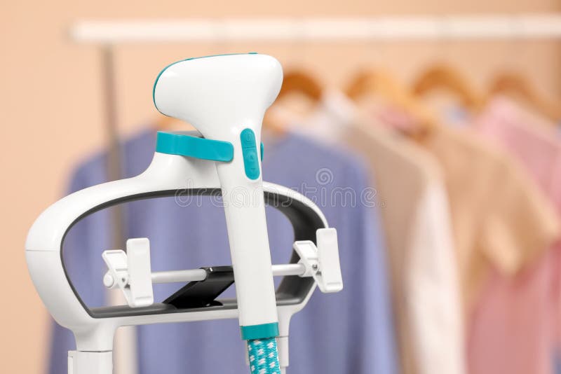 Modern Steam Iron at Home, Closeup. Space for Text Stock Photo - Image ...