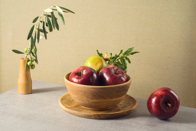 Modern Still Life Composition with Red Apples, Pomegranate and Olive ...