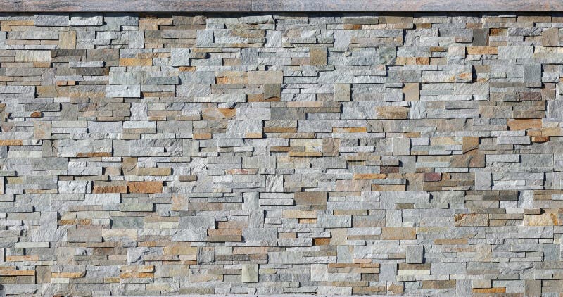 Grey Stone Wall Cladding Made of Strips and Square Blocks Stacked ...