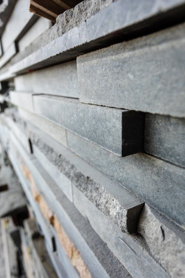 A Modern Stone Wall Made of Long Large Cuts of Stones. Stock Image ...