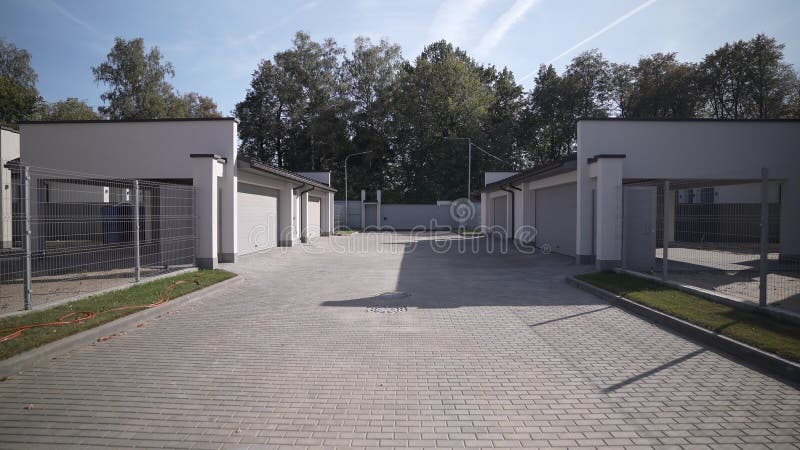 The Modern Storage Facility Features Stylish Concrete Pathways for Easy ...