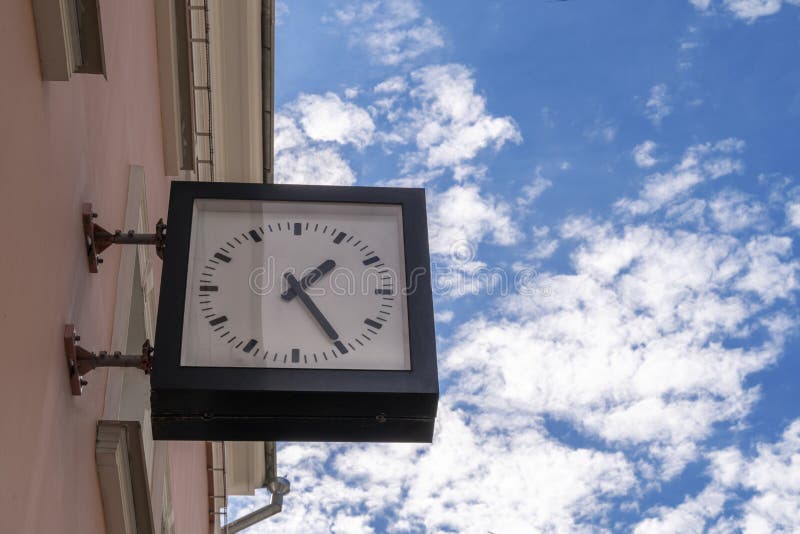 Modern Street Clock on the Wall of Building Stock Photo - Image of wall ...