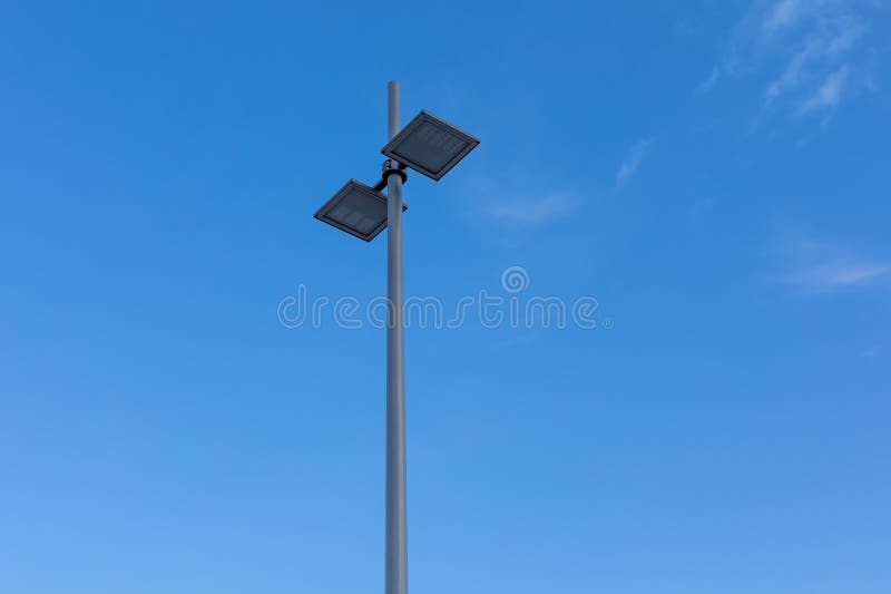 A Modern Street Lamp on a Blue Sky Background. Double Arm Street Light ...