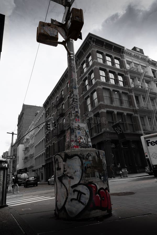 Modern Streetlight in a Bustling Urban Setting Adorned with Colorful ...