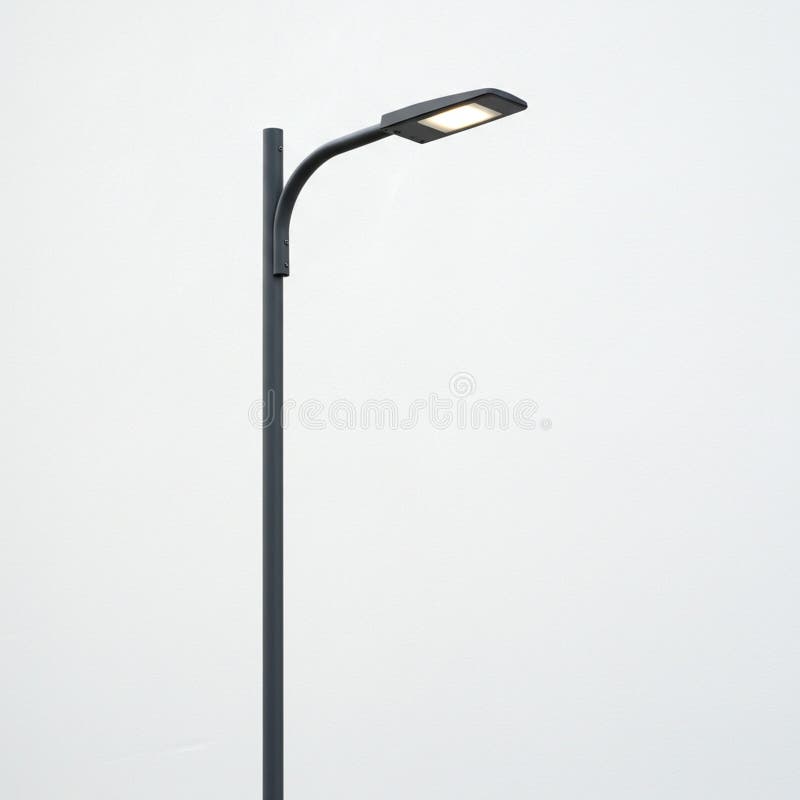 A Modern Streetlight with a Sleek, Dark Metal Pole and a Rectangular ...