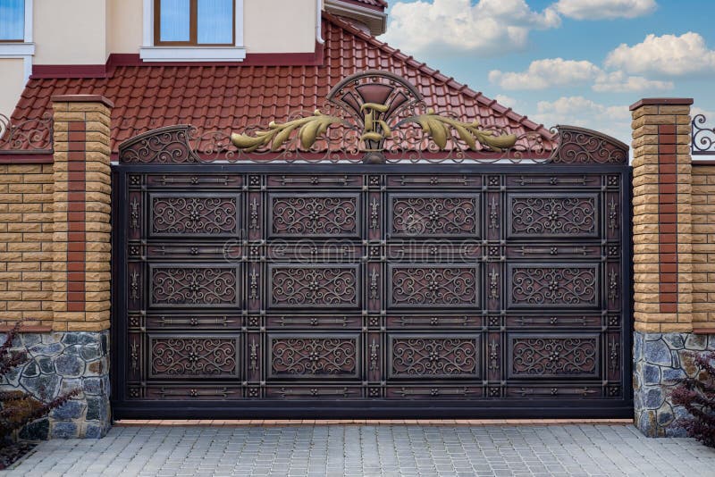 Modern Strong Decorative Gates with Wrought Iron Elements Near a ...