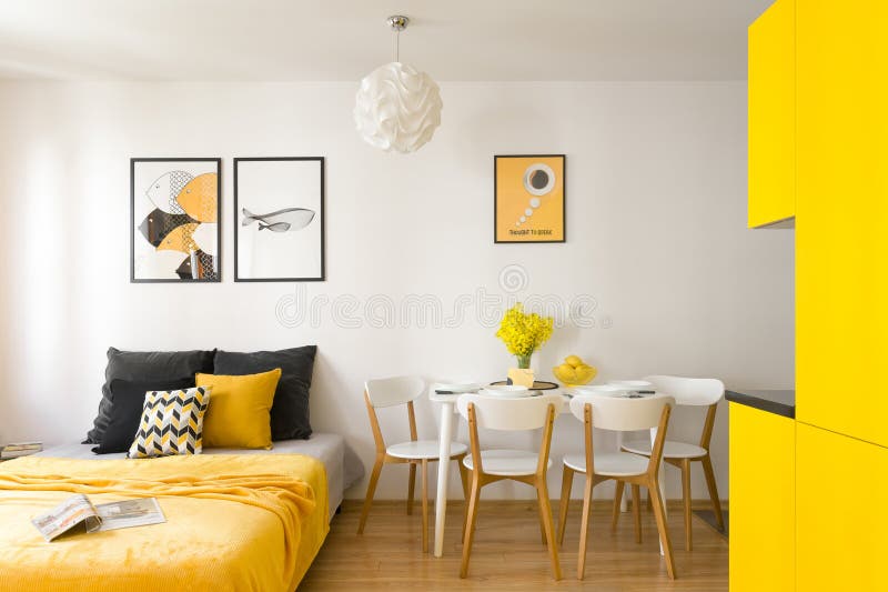 Modern Studio with Yellow Accents and Fish Graphics Editorial Stock Photo - Image of decorations ...