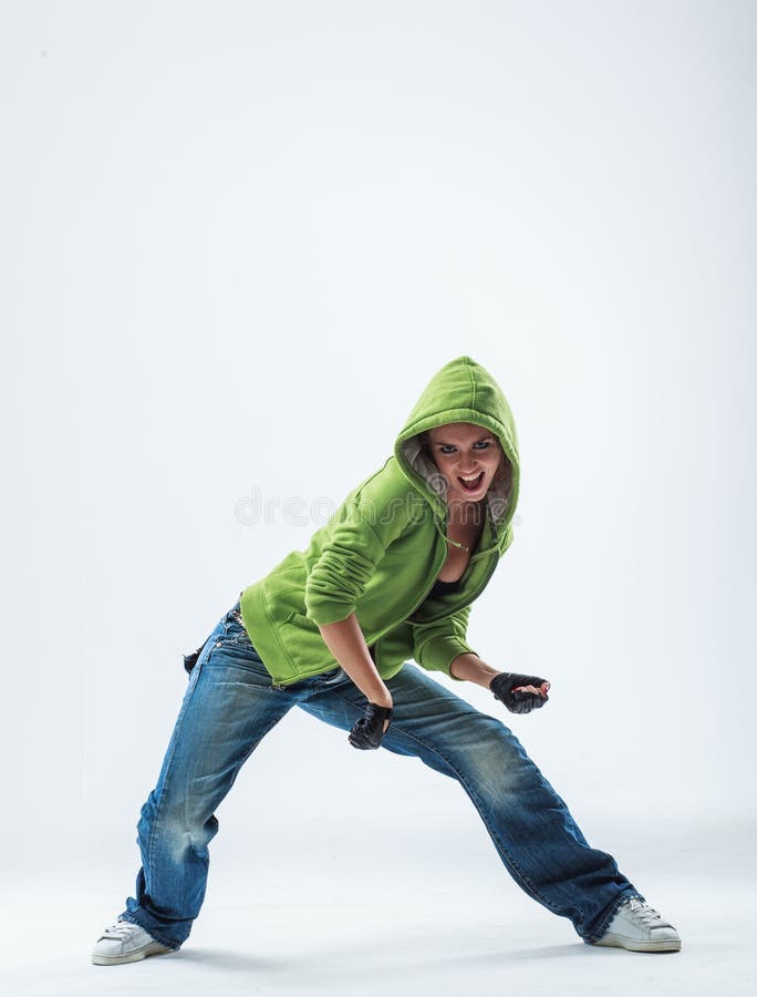 Young Woman Jumping on Studio Backdrop Stock Photo - Image of jump ...