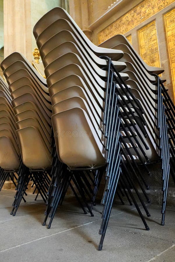Modern Style Chairs Stacked High Stock Photo - Image of chairs, grey ...