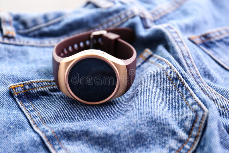 Modern Stylish Smart Watch on Jeans, Closeup Stock Photo - Image of ...