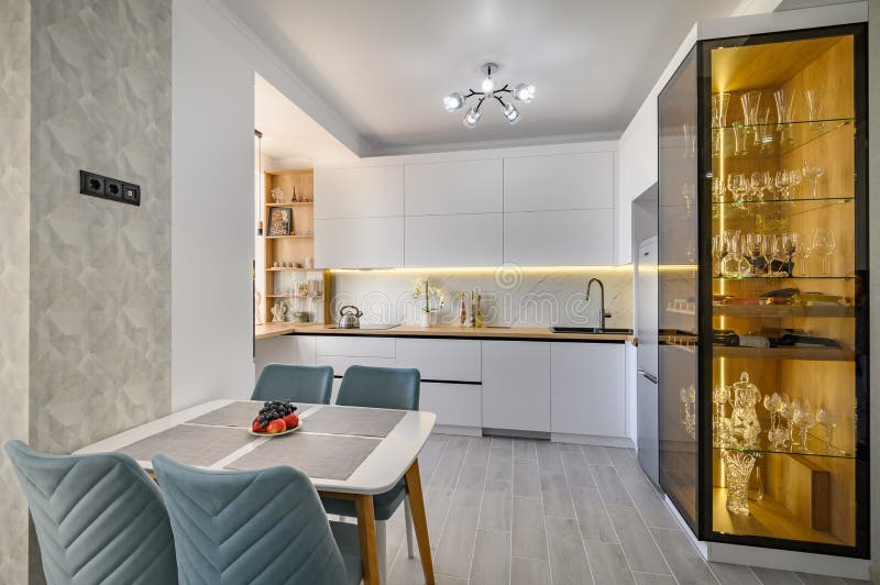 Modern and Stylish White Kitchen in Studio Apartment Stock Image - Image of room, ideas: 264231709