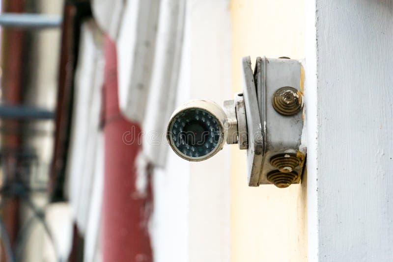 A Modern Surveillance Camera Mounted on the Wall of a Guarded Building ...