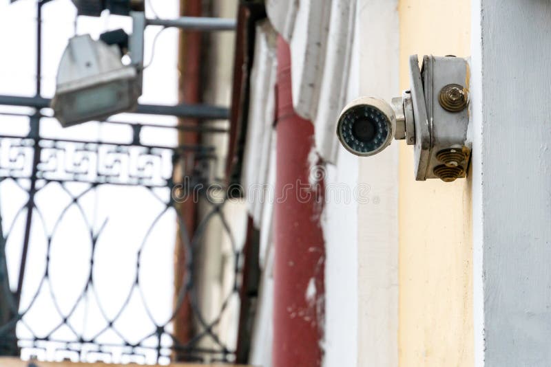 A Modern Surveillance Camera Mounted on the Wall of a Guarded Building ...