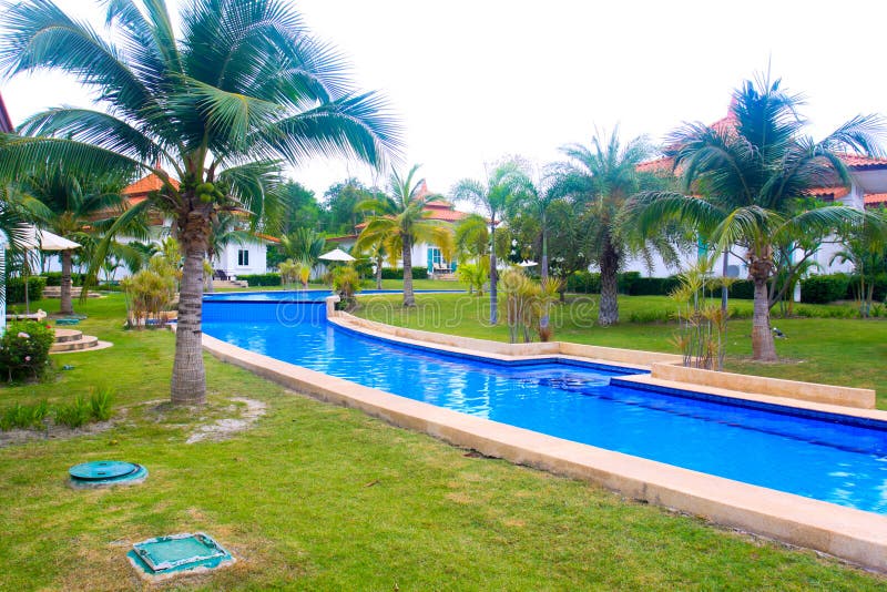 Modern Swimming Pool Relaxing Time Stock Photo - Image of ripple, green ...