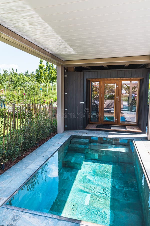 Modern Swimming Pool and Sauna in a Garden Stock Photo - Image of ...