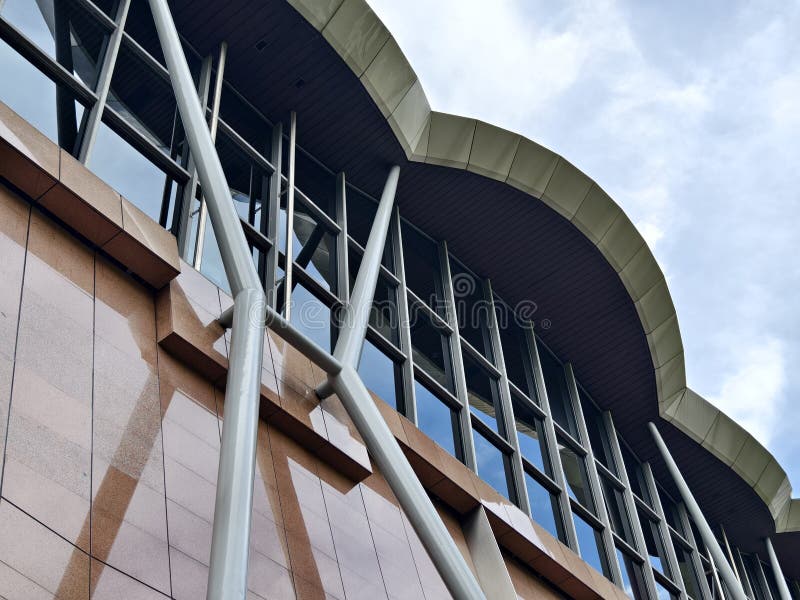 A Modern Tall Building that Features a Significant Amount of Glass ...