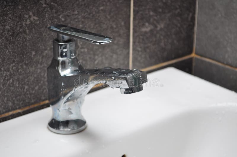 Modern tap in bathroom stock photo. Image of restroom - 51217722