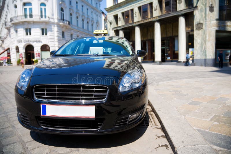 Modern taxi in a city stock photo. Image of built, outdoors - 6701438