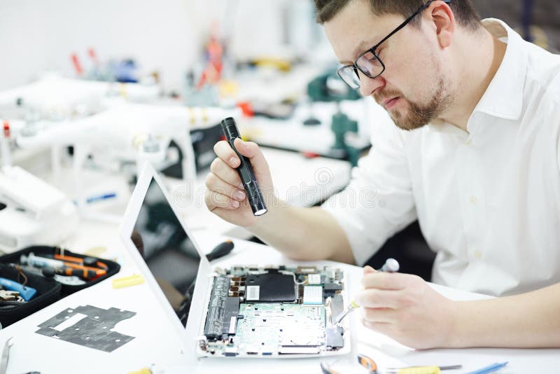 Modern Technician Inspecting Laptop for Broken Parts Stock Image ...