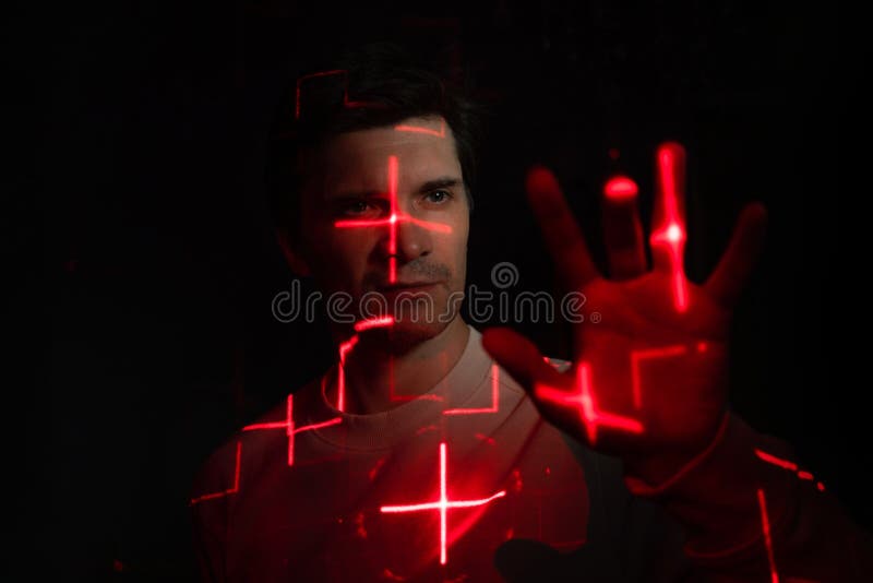 Modern Technologies and Human. Young Man with Projection of Red Lines ...