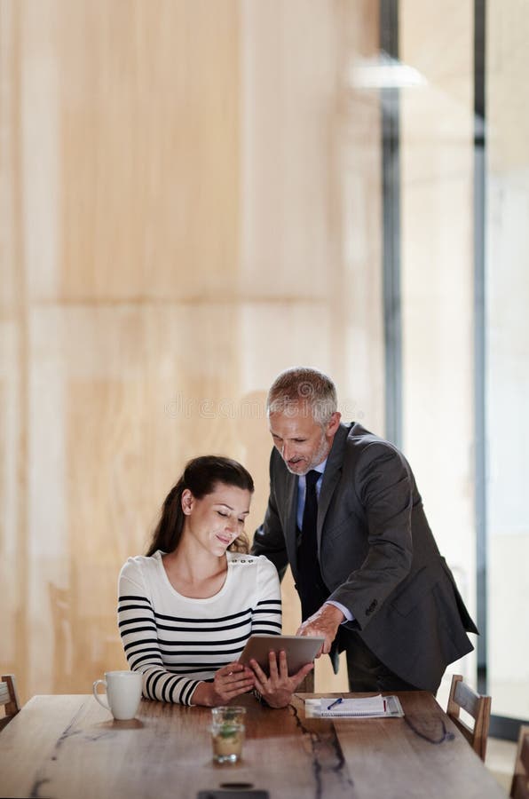 Modern Technology Gives Them the Business Edge. Colleagues Using a ...