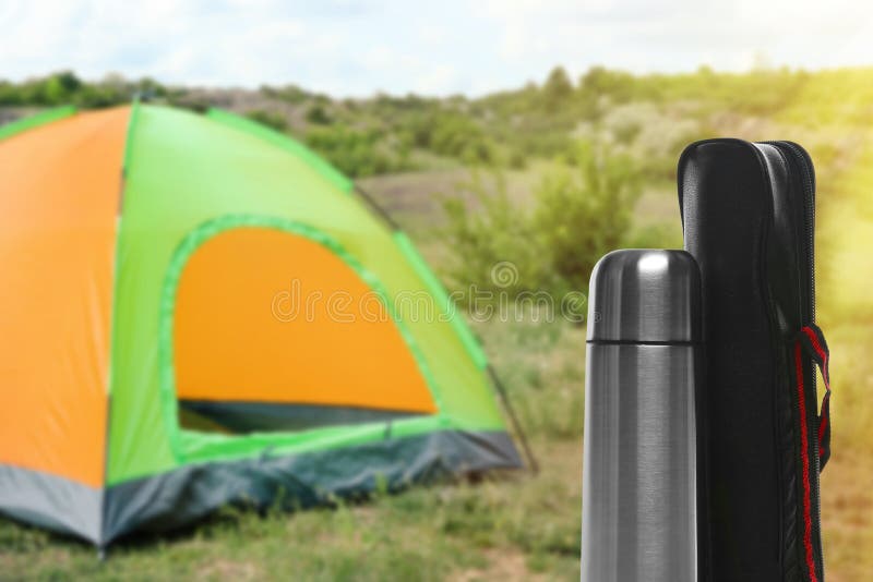 Modern Thermos and Case Outdoors, Space for Text. Camping Season Stock ...