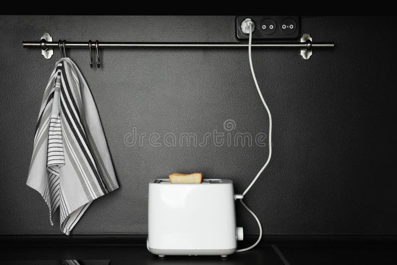 Modern Toaster on Black Countertop in Kitchen Stock Photo - Image of ...