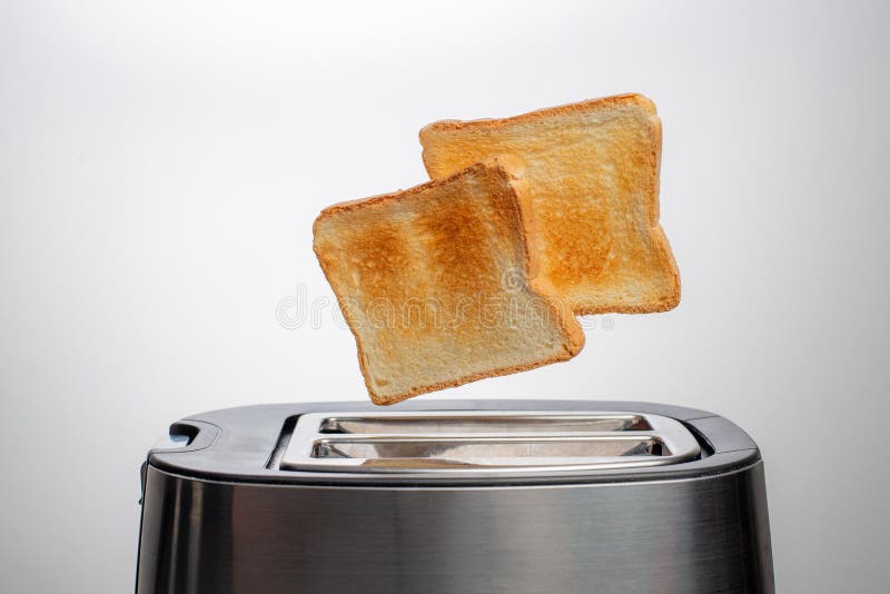 Modern Toaster with Bread Slices on White Background Stock Image ...