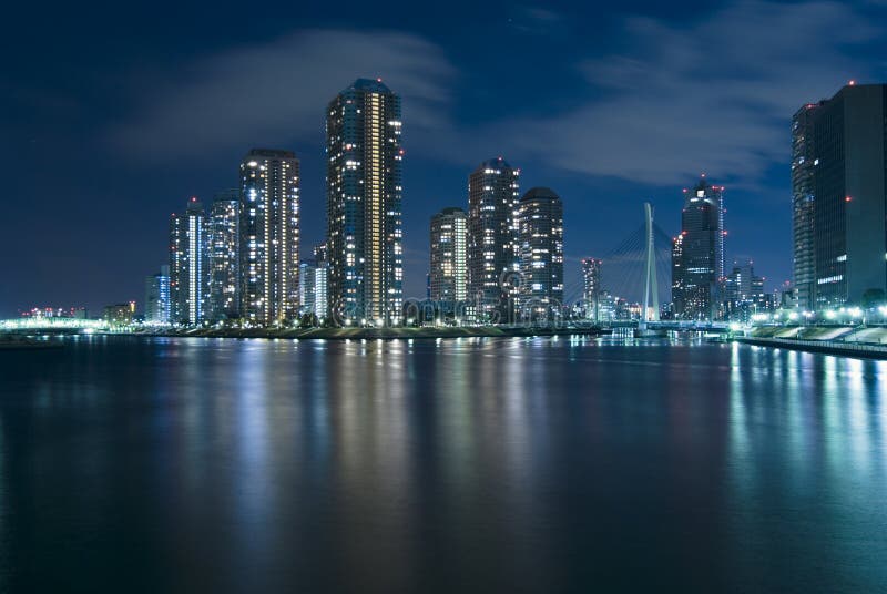Modern Tokyo at night stock photo. Image of reflection - 4499738