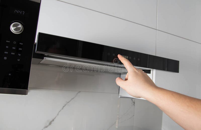 Modern Touch-controlled Kitchen Hood in Black with a White Kitchen ...